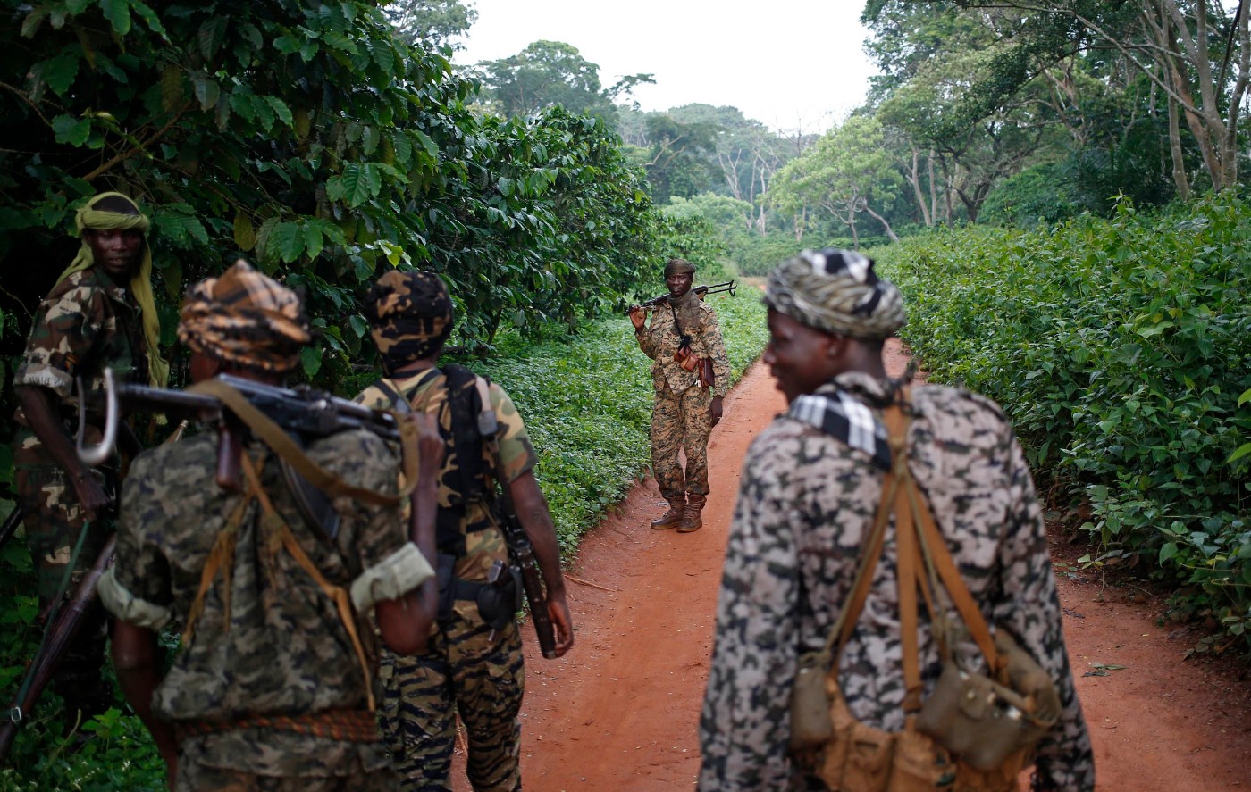 Seleka fighters patrol as they search for Anti-Balaka Christian militia ...