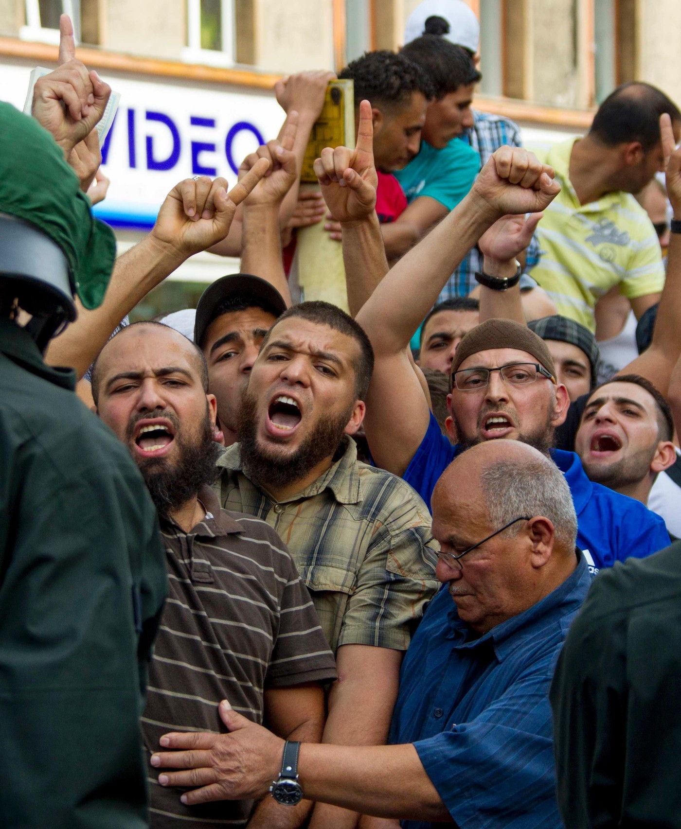 Muslims shout slogans as they protest against rally of nationalist Pro ...
