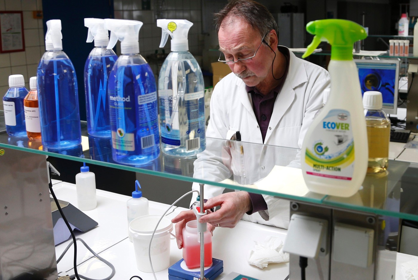 A chemist works on samples of detergent in the laboratory of the Ecover ...