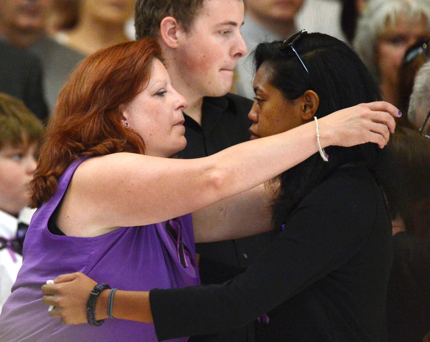 Theresa Hoover, mother of Alexander J. "AJ" Boik, reaches to hug Boik's ...