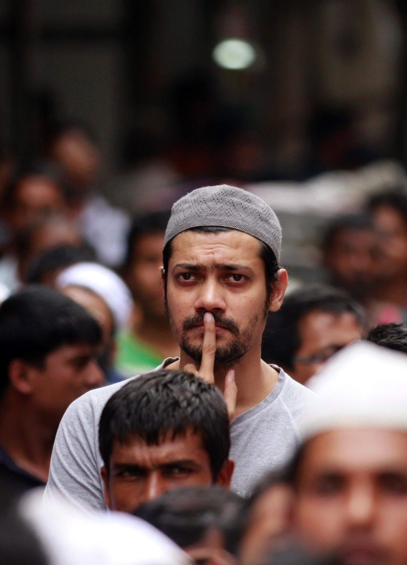 A Bangladeshi Muslim man attends a protest rally at Chawkbazar area in ...