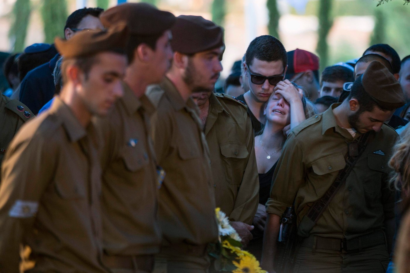Relatives and friends of Israeli soldier Daniel Pomerantz, who was ...