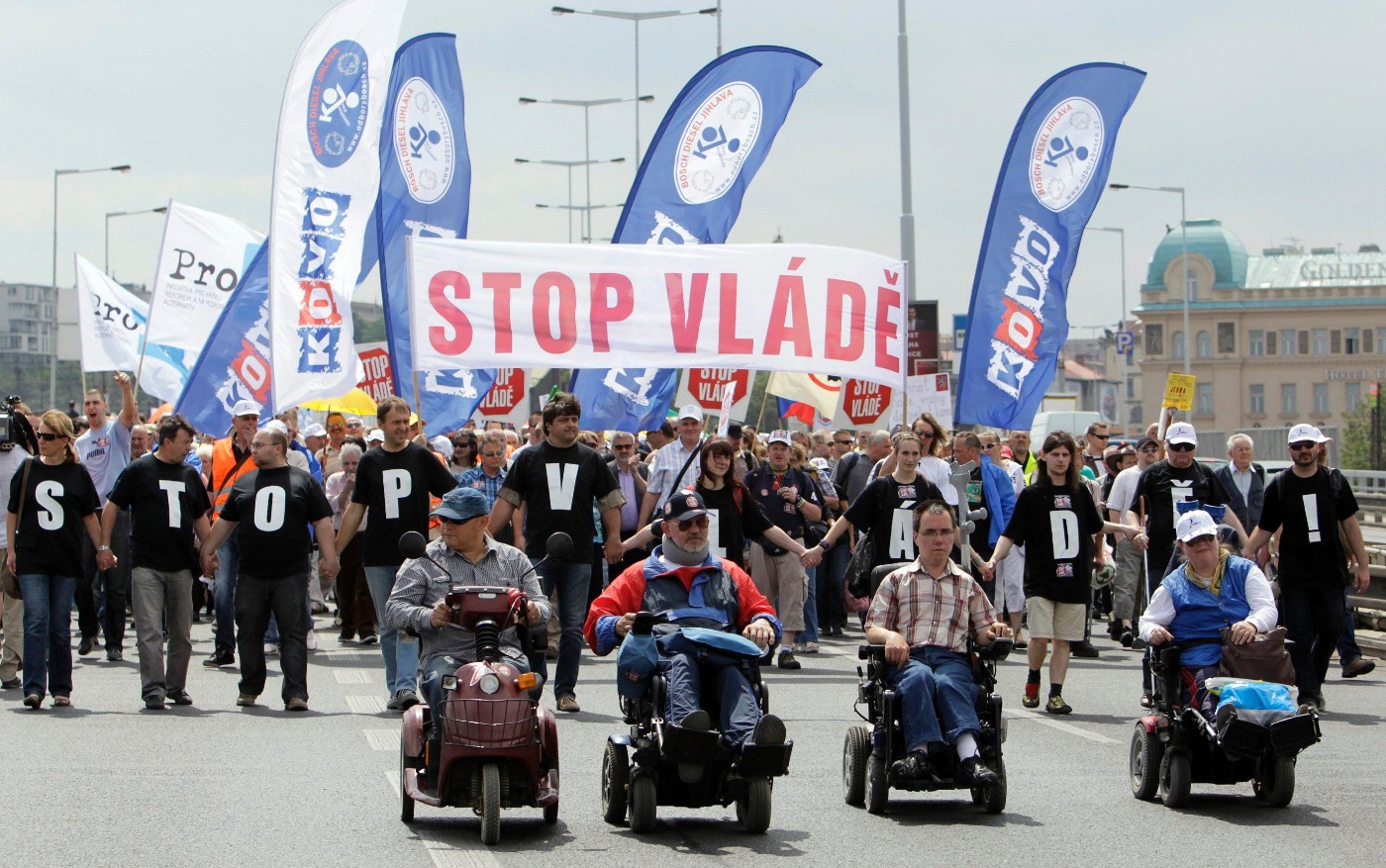 Protesters march during a demonstration in Prague