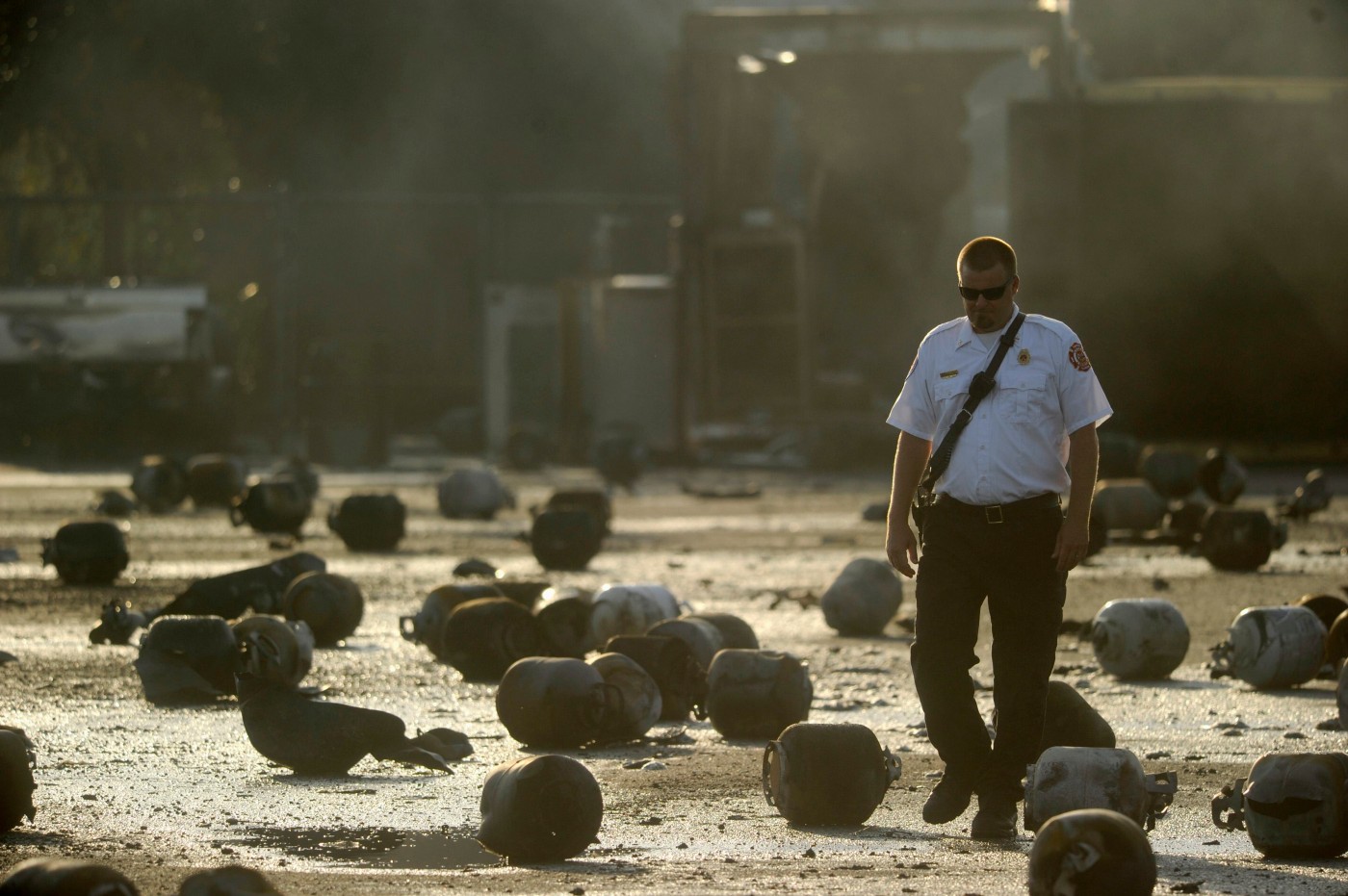 Tavares Fire Battalion Chief Hosterman walks among remains of exploded ...