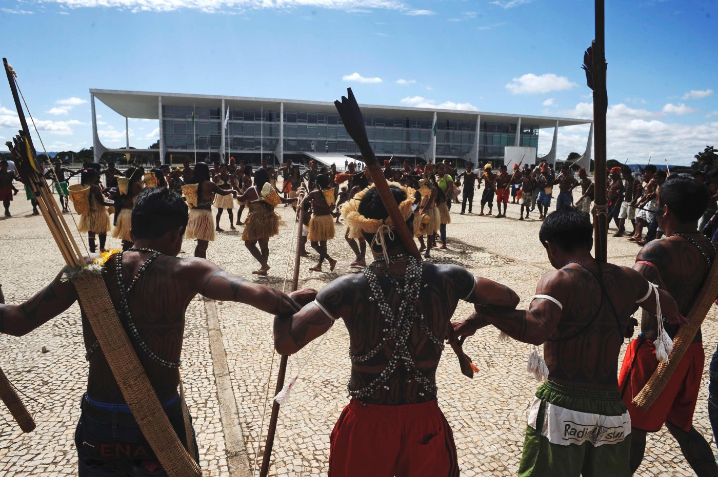 Munduruku Indians do a ritual dance during a protest in front of ...